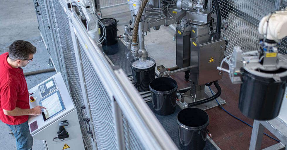 Automated bucket filling line